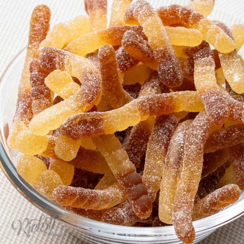 Želejas konfektes "Cukurotās kolas garšas tārpiņi", 1 kg - Rieksti Jums